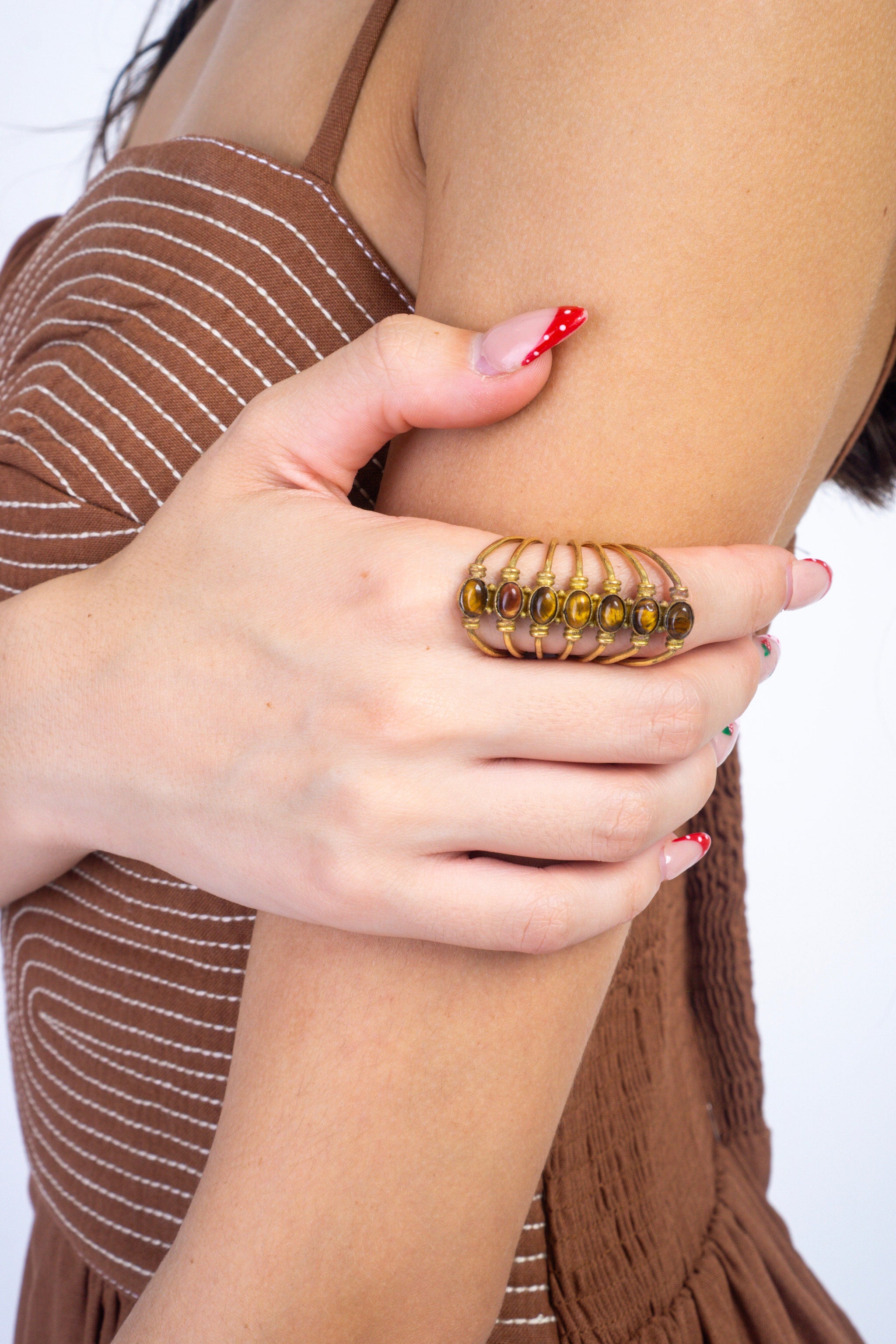 Gold Ribcage Ring Brown Stone
